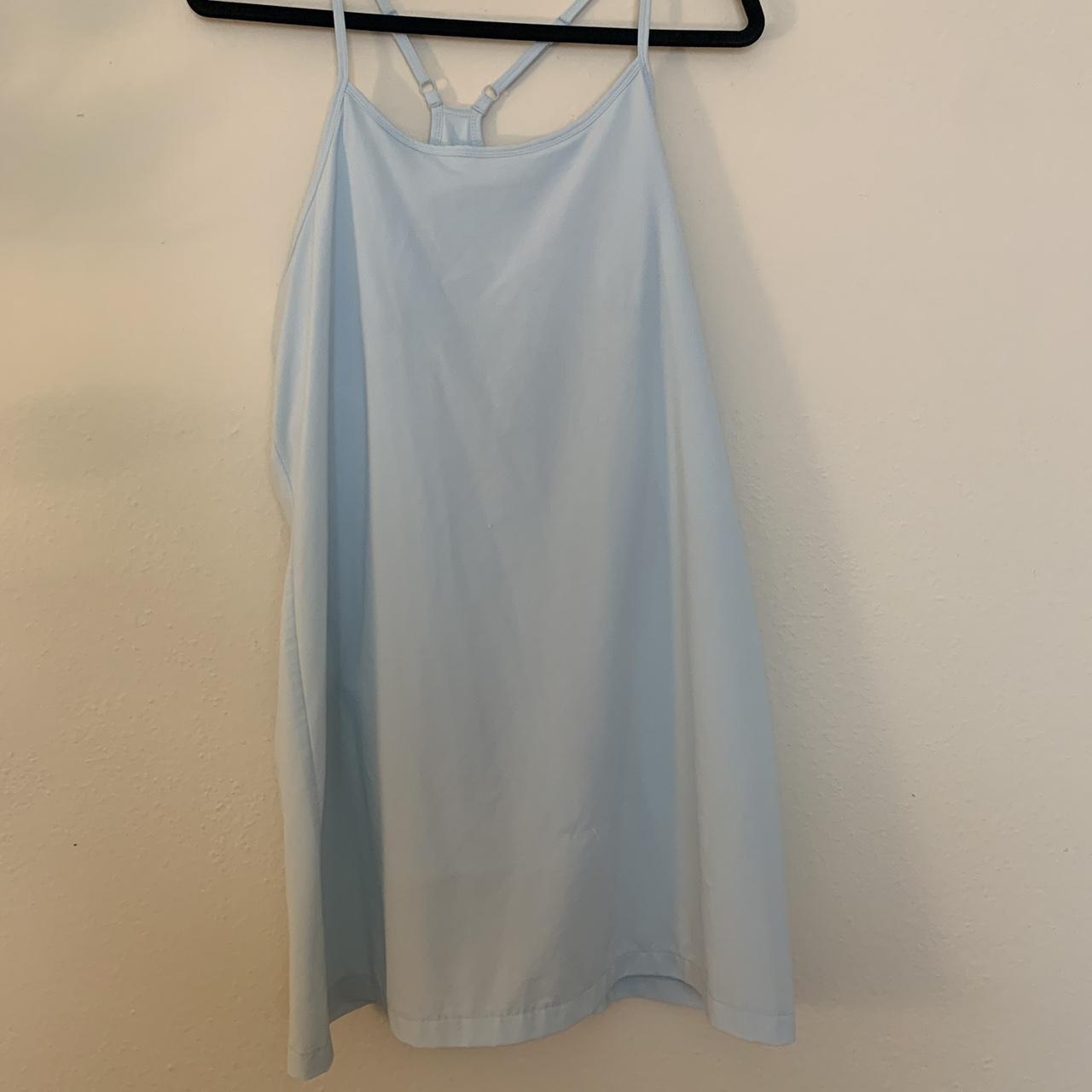 Light blue exercise dress- two small snags shown in... - Depop