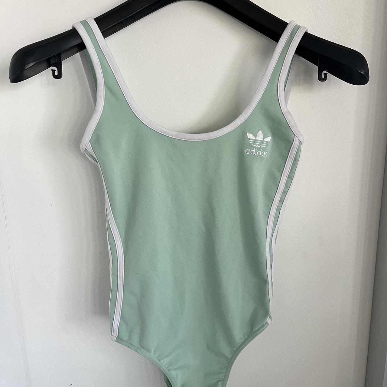 Adidas body in light turquoise / green with scooping... - Depop