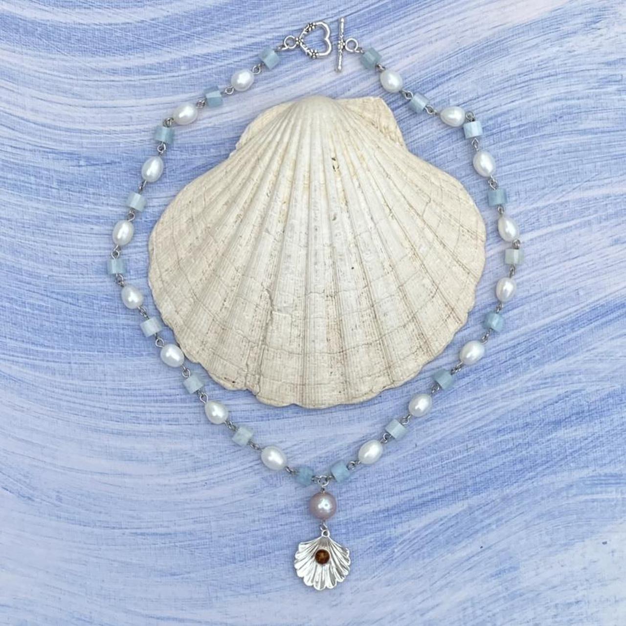 Aquamarine, Pearl & amber shell necklace Made with... | Depop