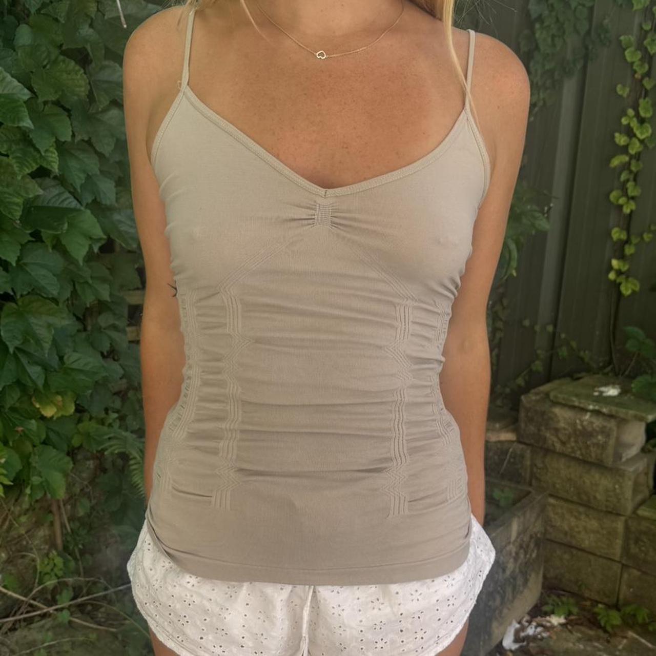 Tan tank/singlet with ruched detailing and... | Depop