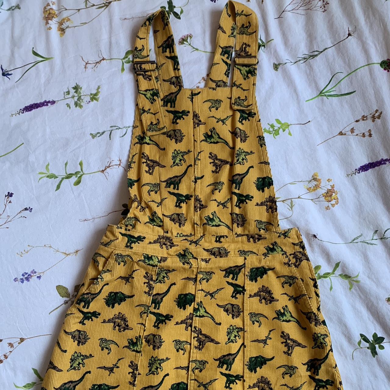 Run & Fly Dungaree dress, Gold Dino print, Size 8... - Depop