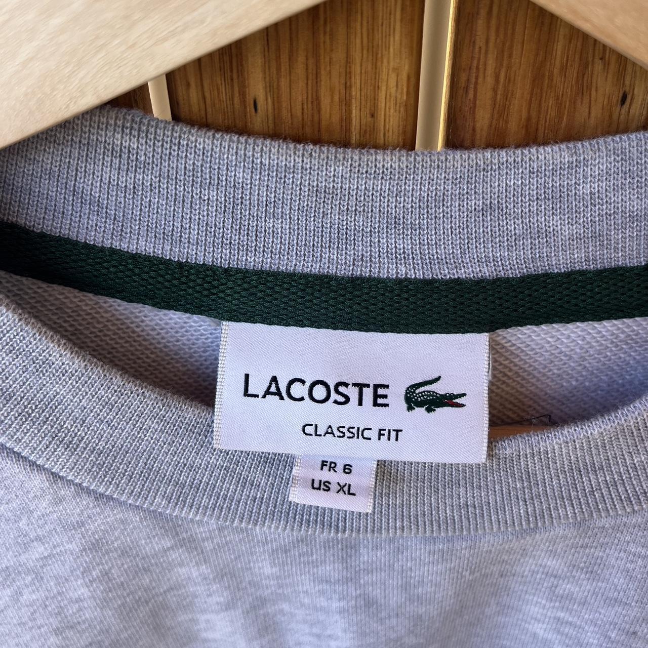 Lacoste Classic Fit Grey Crew fits like a medium... - Depop