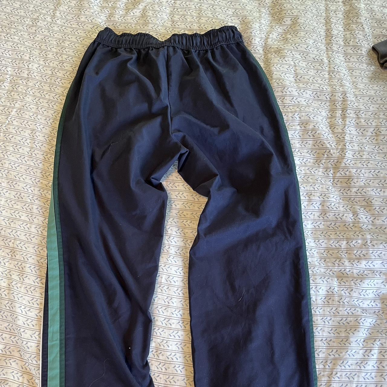 cute track pants, feel like sweatpants. stripe on... - Depop