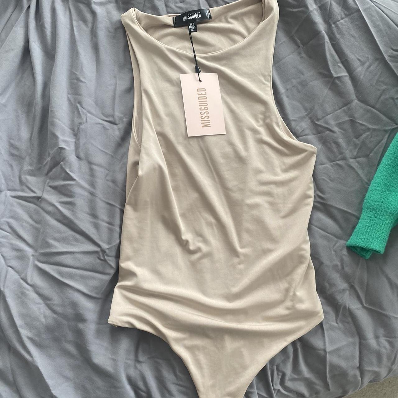 Missguided cream racer neck bodysuit Size: 6... - Depop