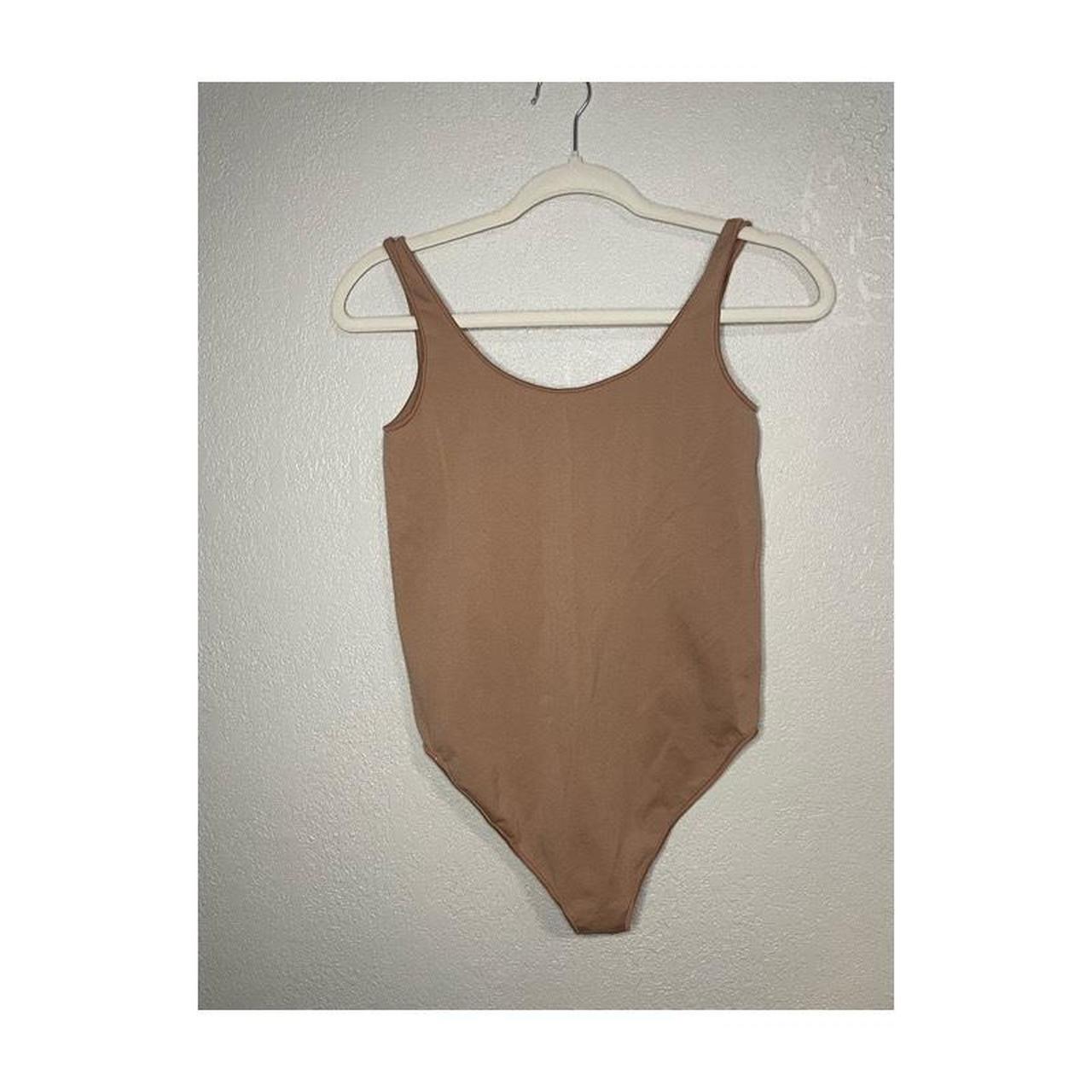SKIMS essential bodysuit thong Comfy level :... - Depop