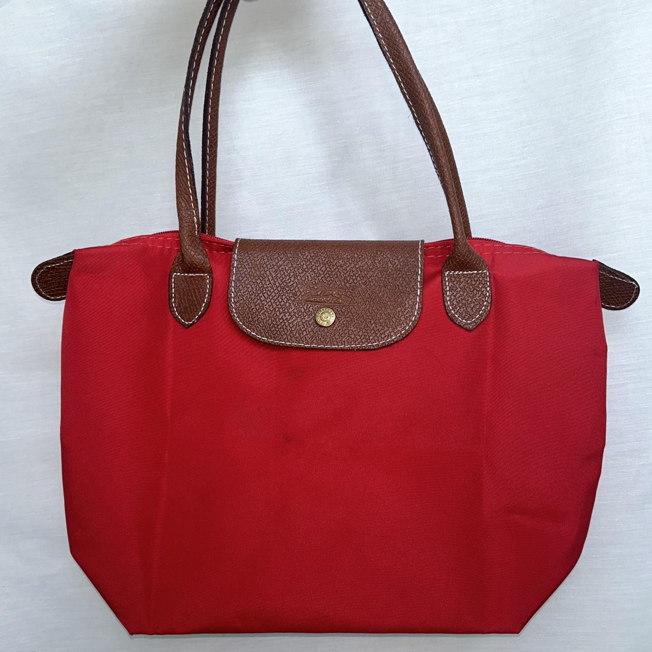 Red longchamp le pilage bag, zipper works but the... - Depop