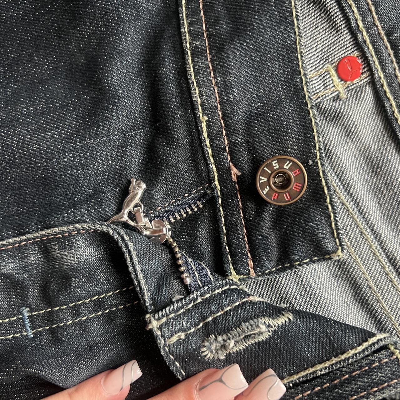 vintage evisu x puma low waisted slightly flared... - Depop