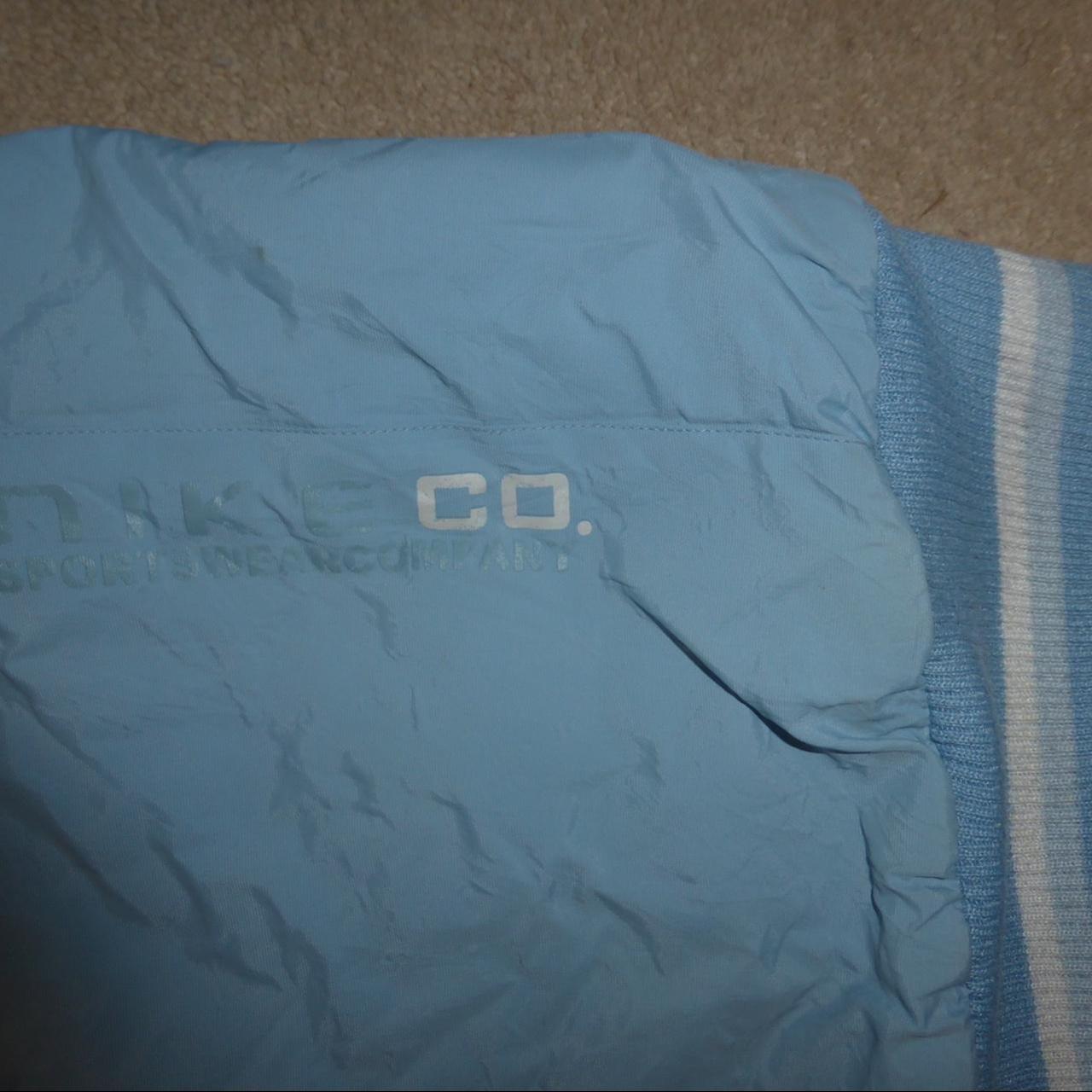 Vintage Nike baby blue track zip up bomber jacket.... - Depop