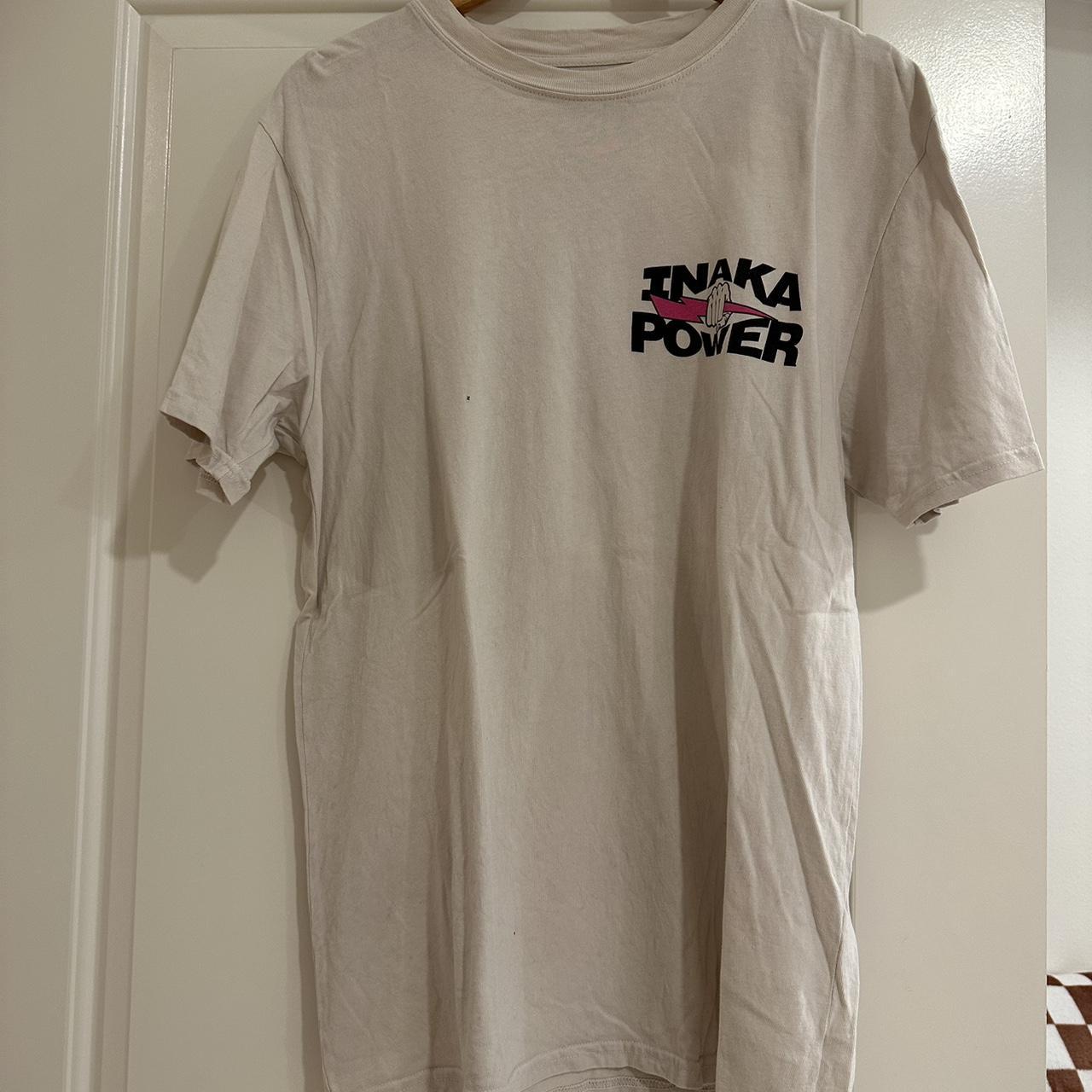 Inaka Power tee MEDIUM Small hole (second pic for... - Depop
