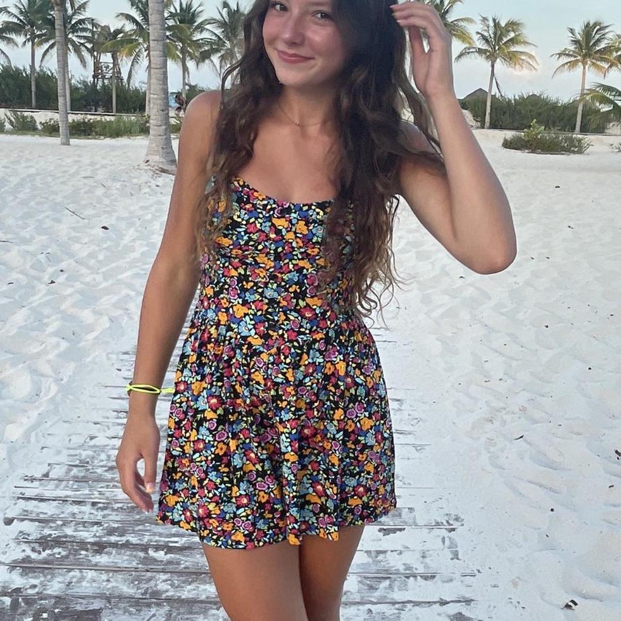 Target floral romper size XS. Could also fit a... - Depop