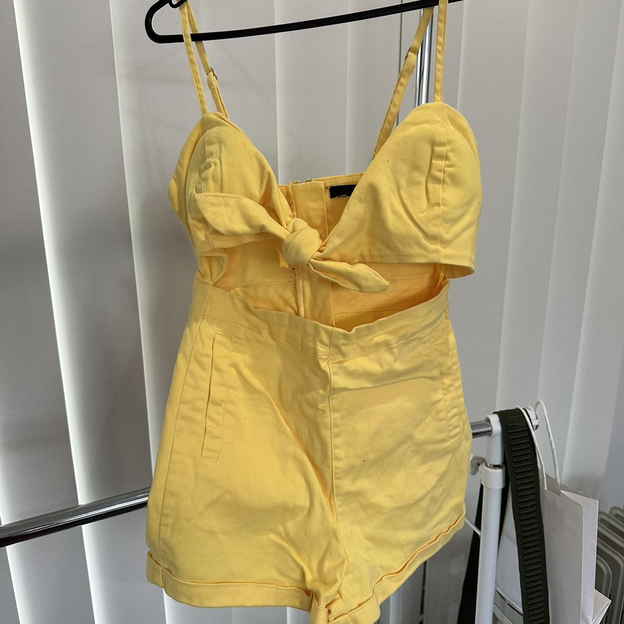 yellow playsuit with front tie - Depop