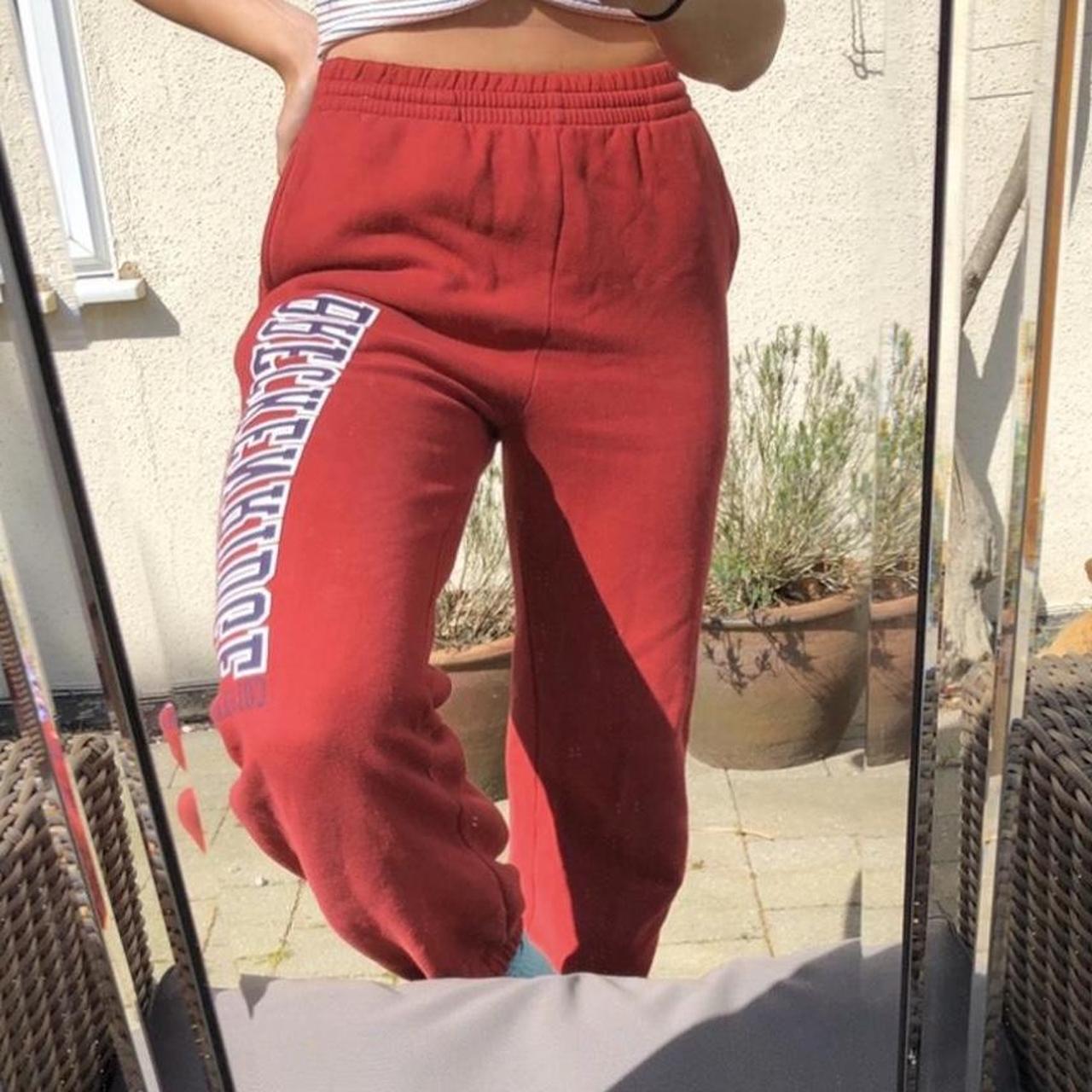 Burgundy and white trackies | Depop