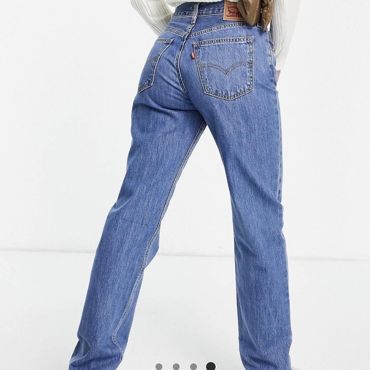 Levis low pro straight leg jeans mid wash W27... - Depop