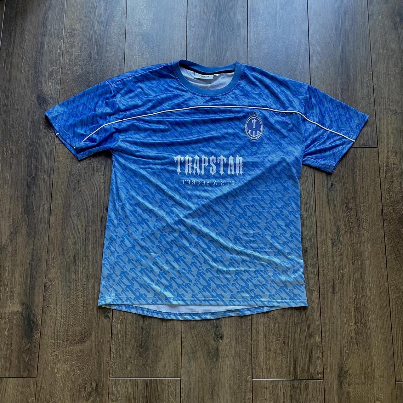 Trapstar football shirt blue Size Large Open to... - Depop