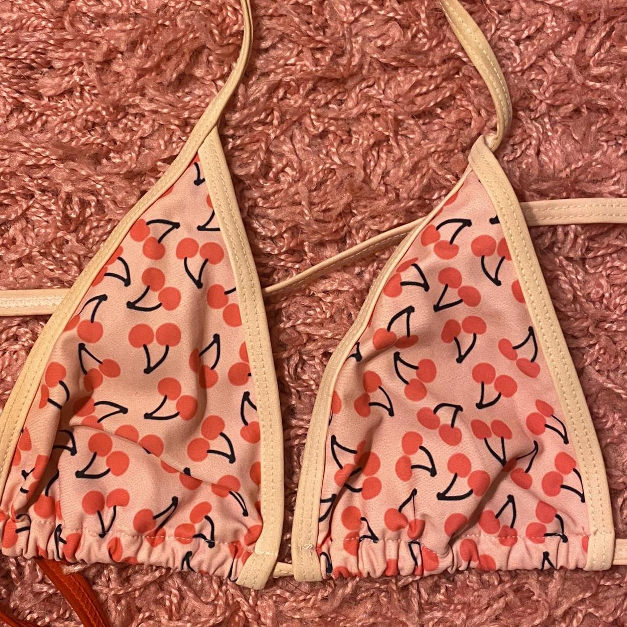 pink on pink cherry triangle top. the lighter pink... - Depop