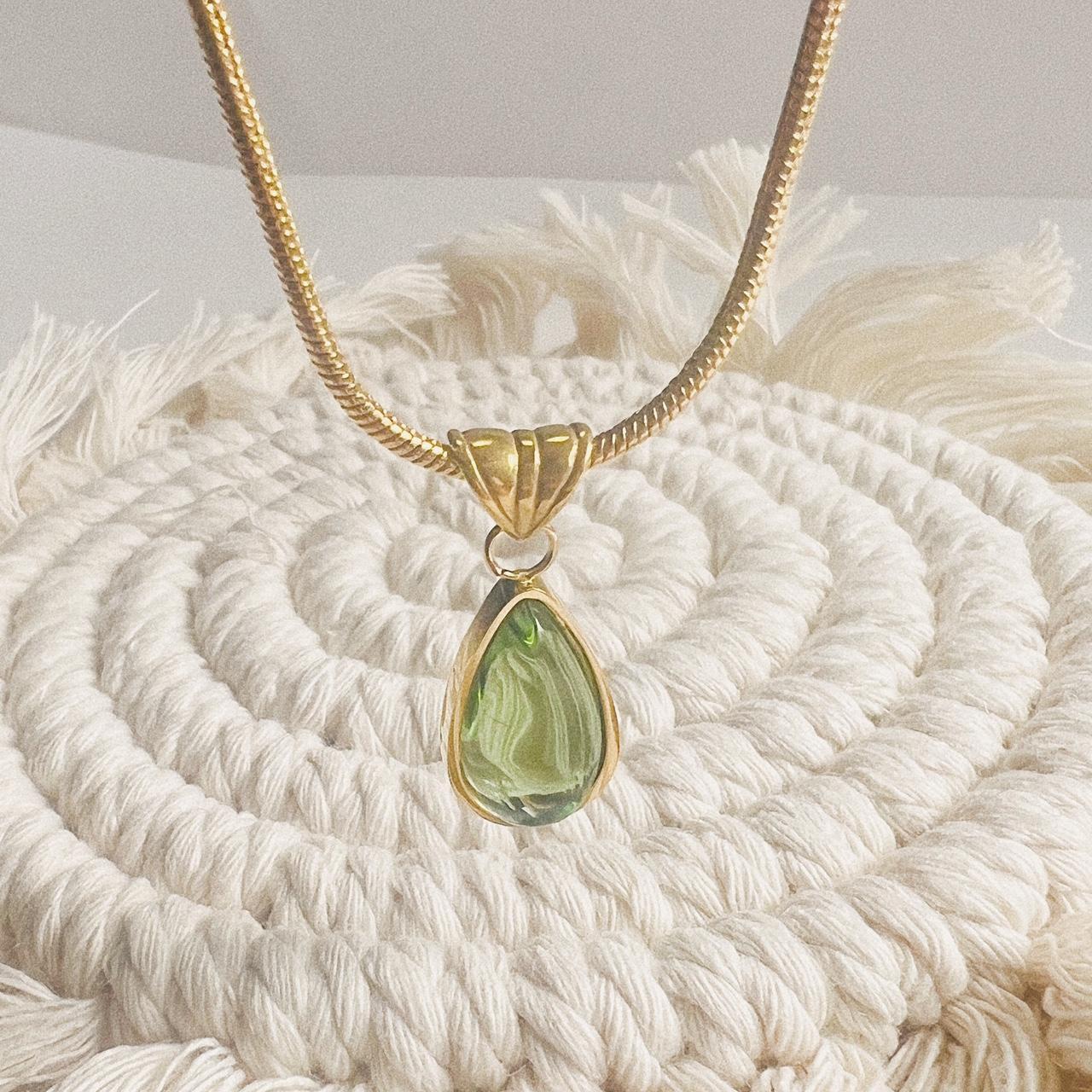 Unisex gold water drop necklace.Unique design... - Depop