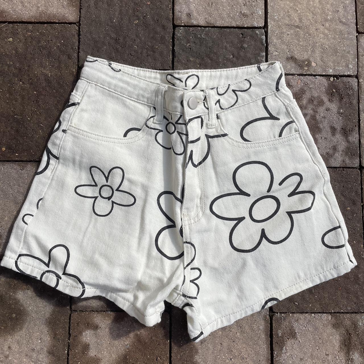 White and black flower pattern shorts from dry goods... | Depop
