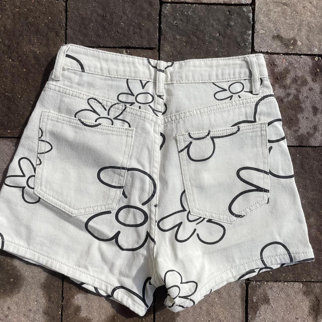 White and black flower pattern shorts from dry goods... | Depop