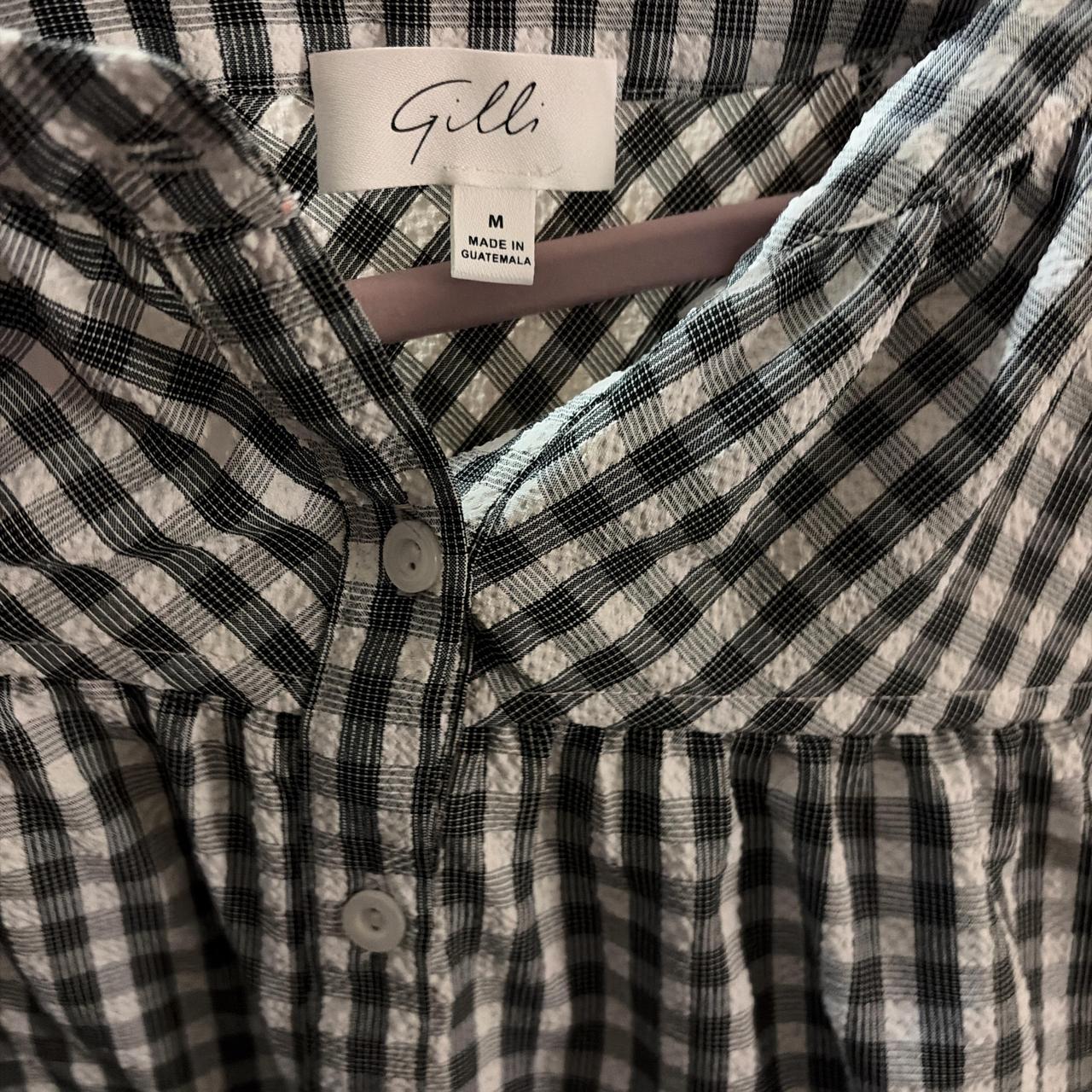 Black and white checkered blouse. Buttons up front.... | Depop