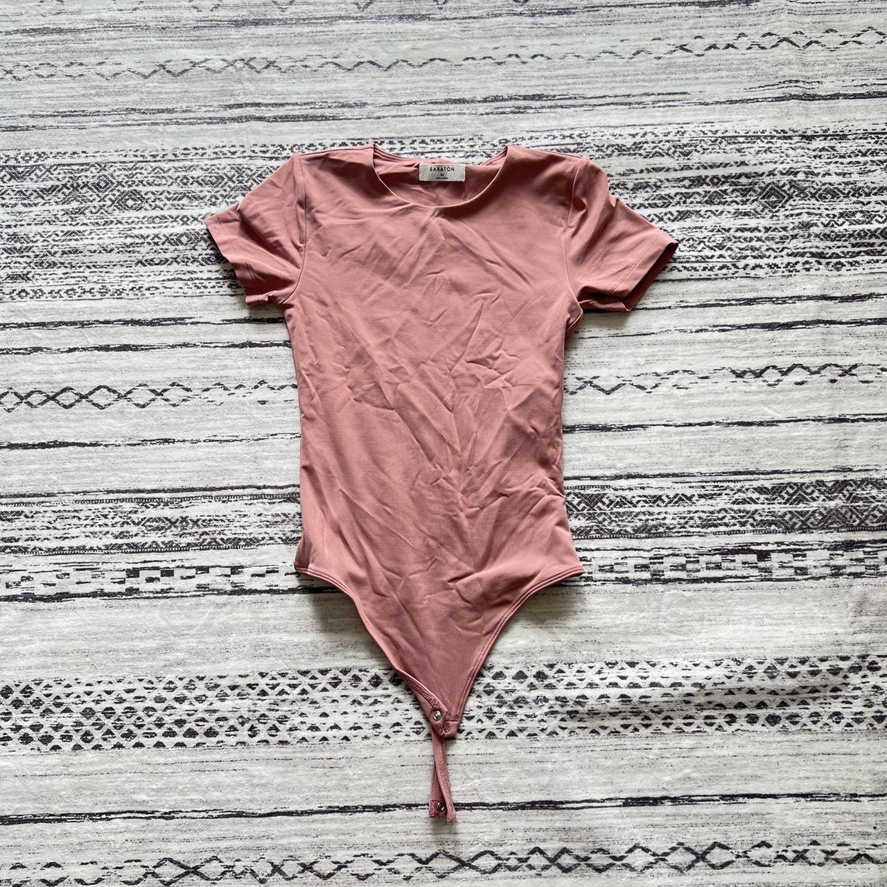 Aritzia Women's Pink Bodysuit | Depop