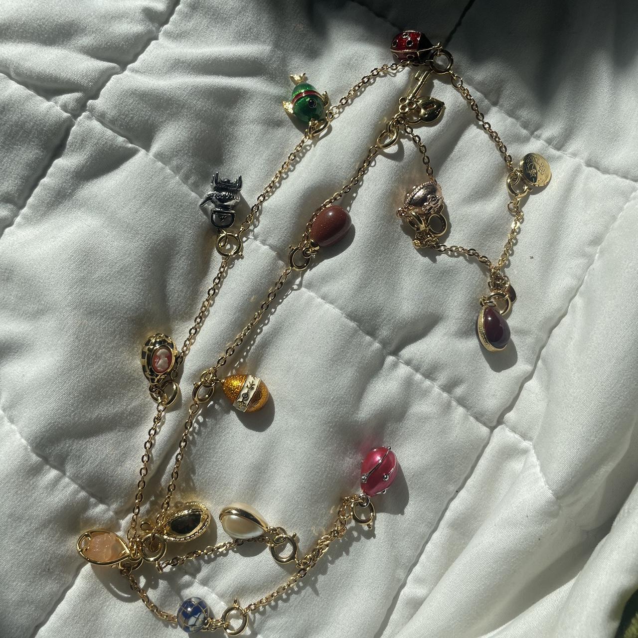 Joan Rivers Egg 15 Charm Necklace This piece of... - Depop