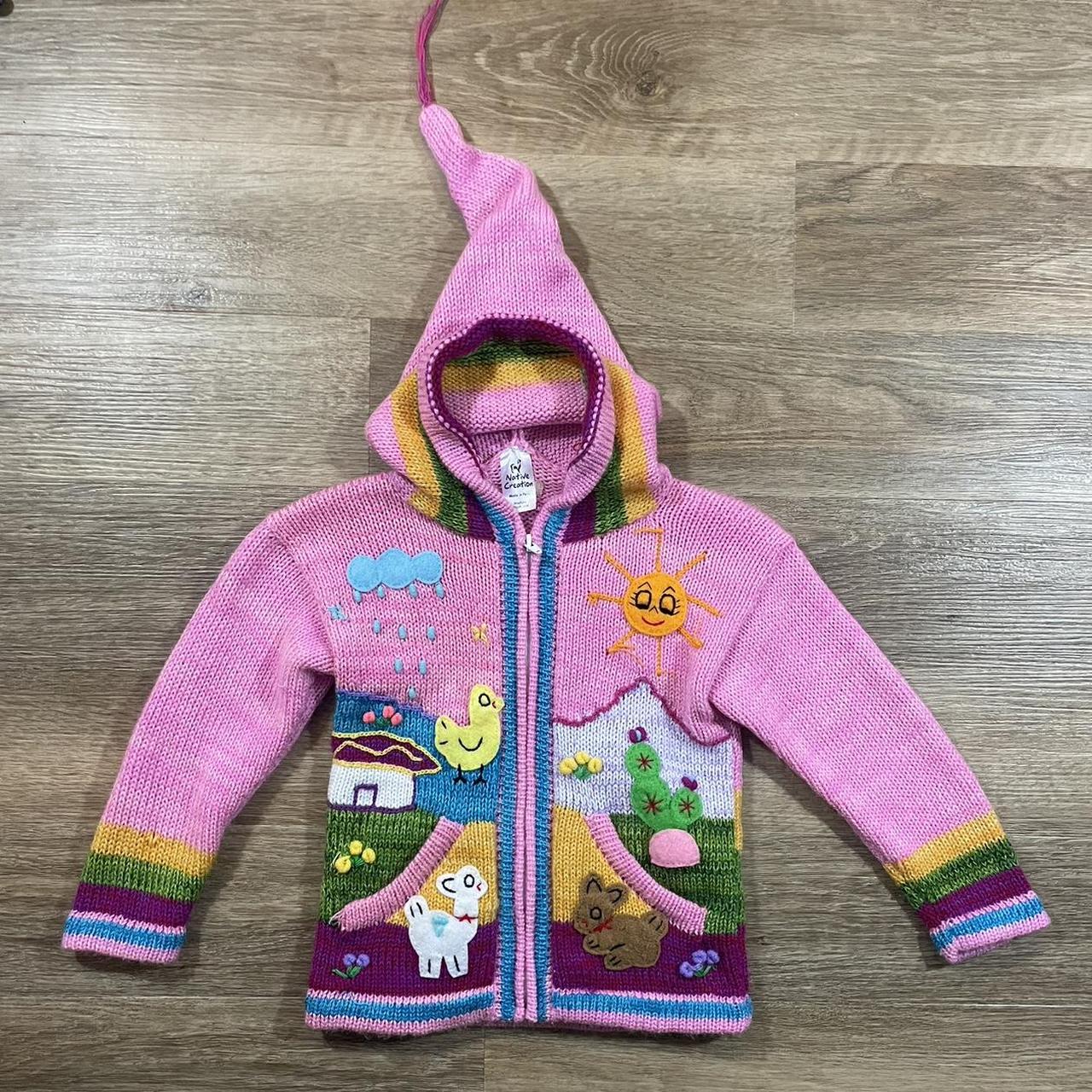 Pink knitted Native Creation kid’s sweater with hand... - Depop
