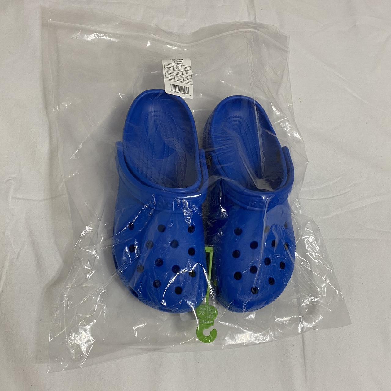 Crocs Women's Blue Slides | Depop