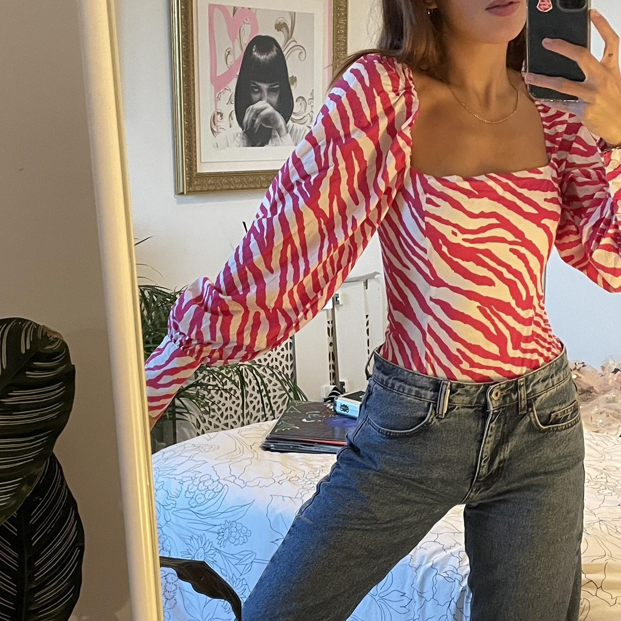 Amazing pink zebra print bodysuit with puffy... - Depop