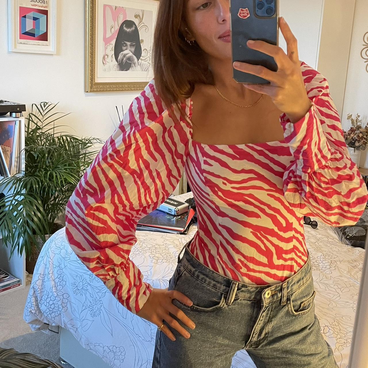 Amazing pink zebra print bodysuit with puffy... - Depop