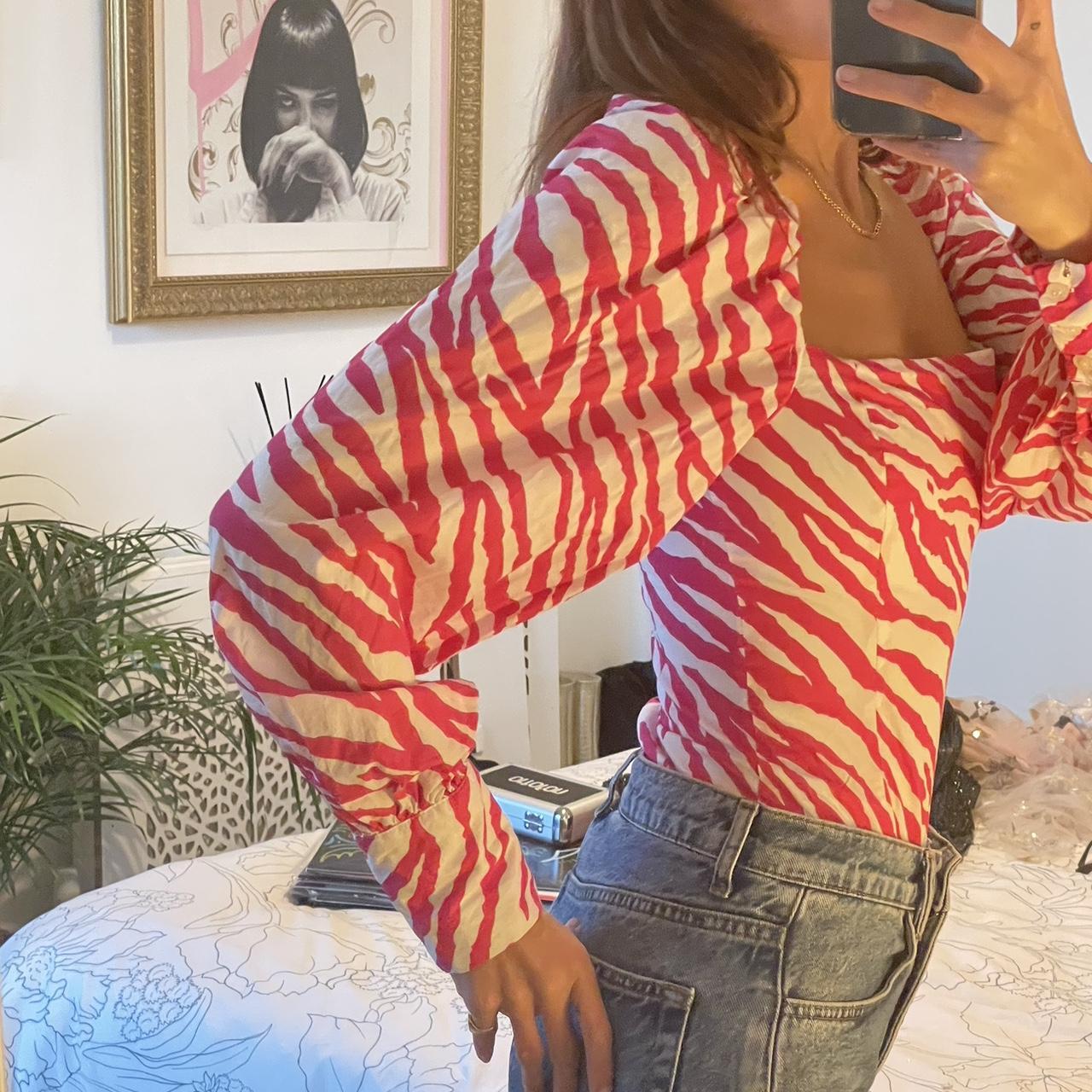 Amazing pink zebra print bodysuit with puffy... - Depop