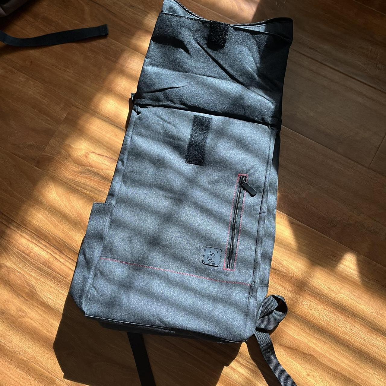 large black chipotle backpack has lots of storage... - Depop