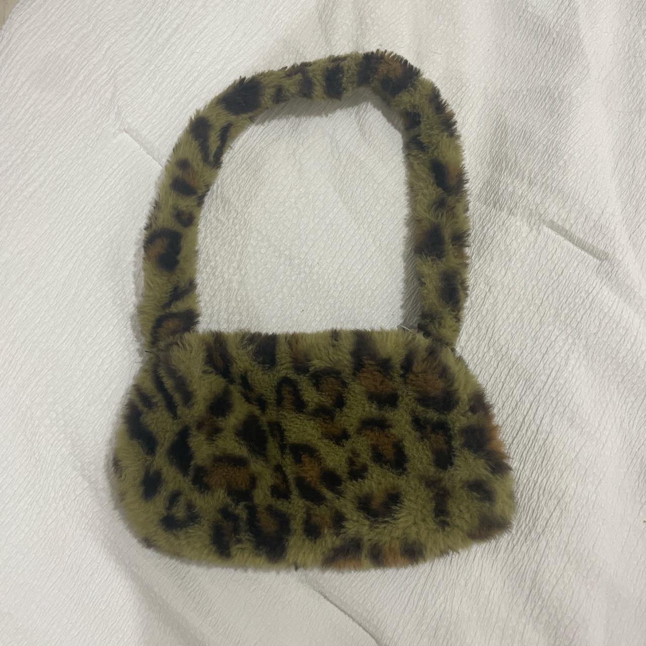 Another super cute fluffy mini bag! This one is... - Depop