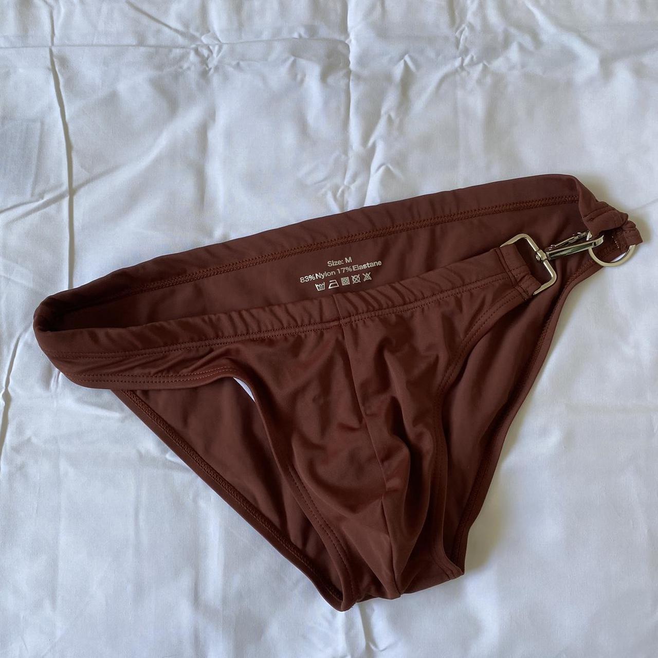 Mens brown speedos with metal clasp/attachment.... - Depop