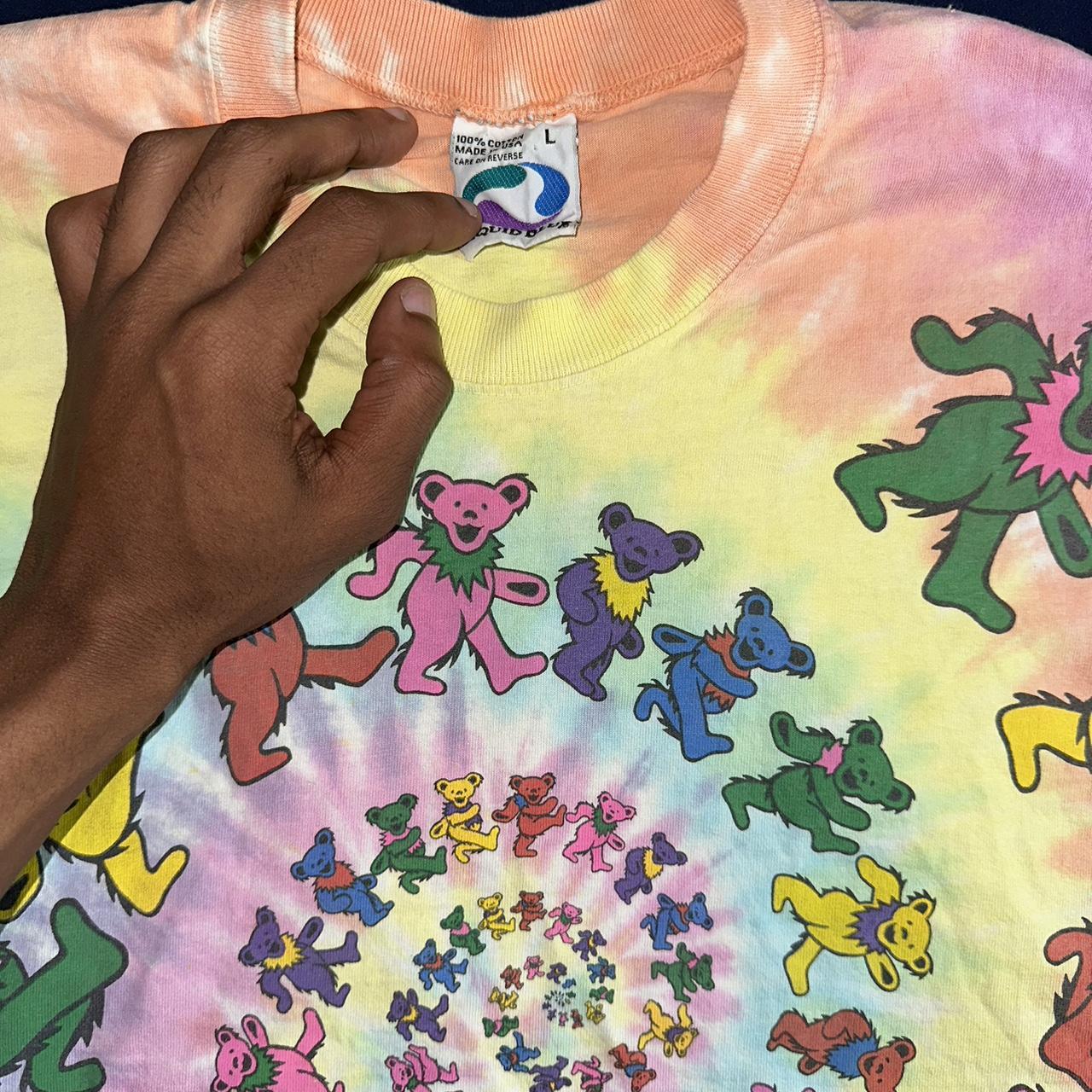 Vintage Liquid Blue T Shirt - Depop