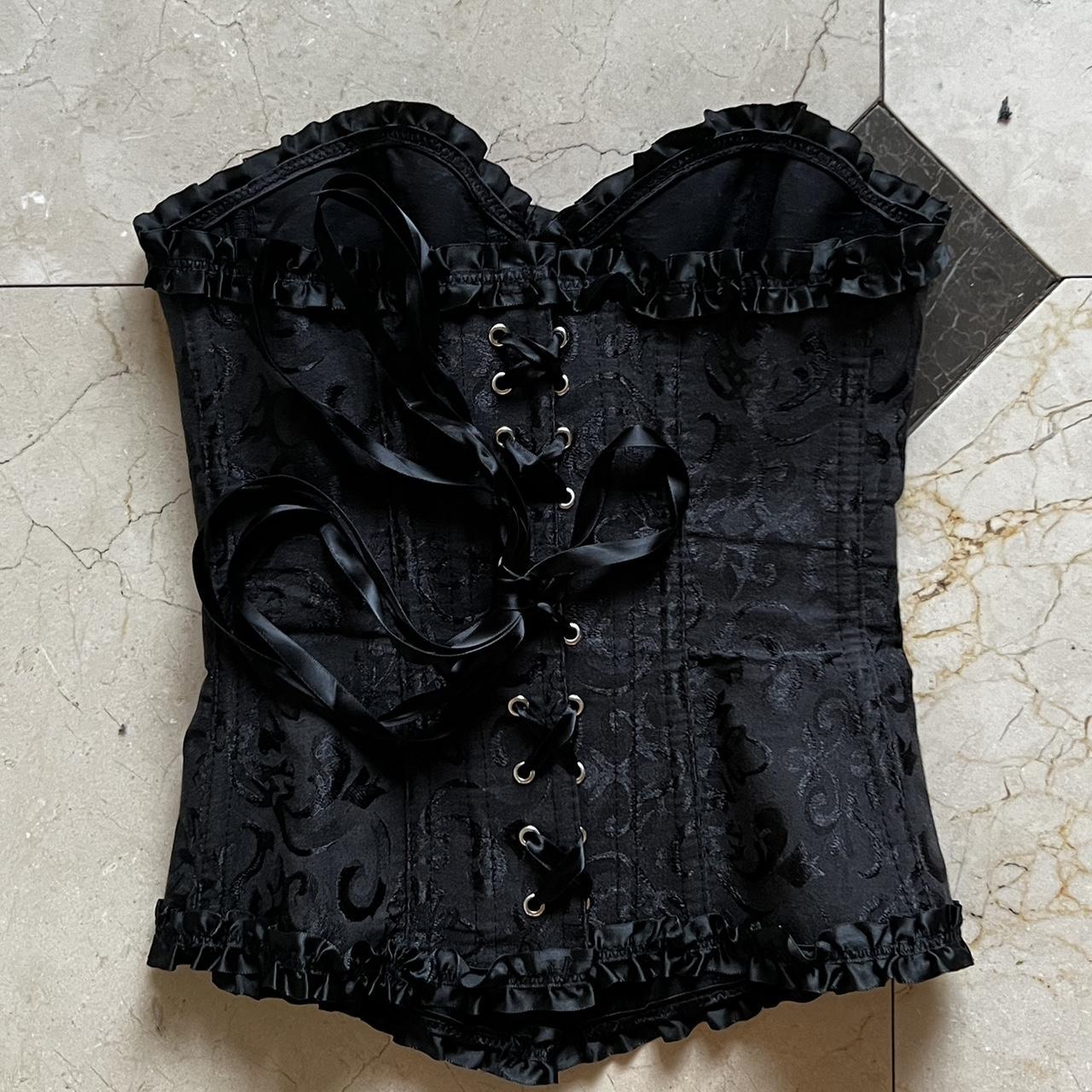 Beautiful black boned lace corset with a ribbon tie... - Depop