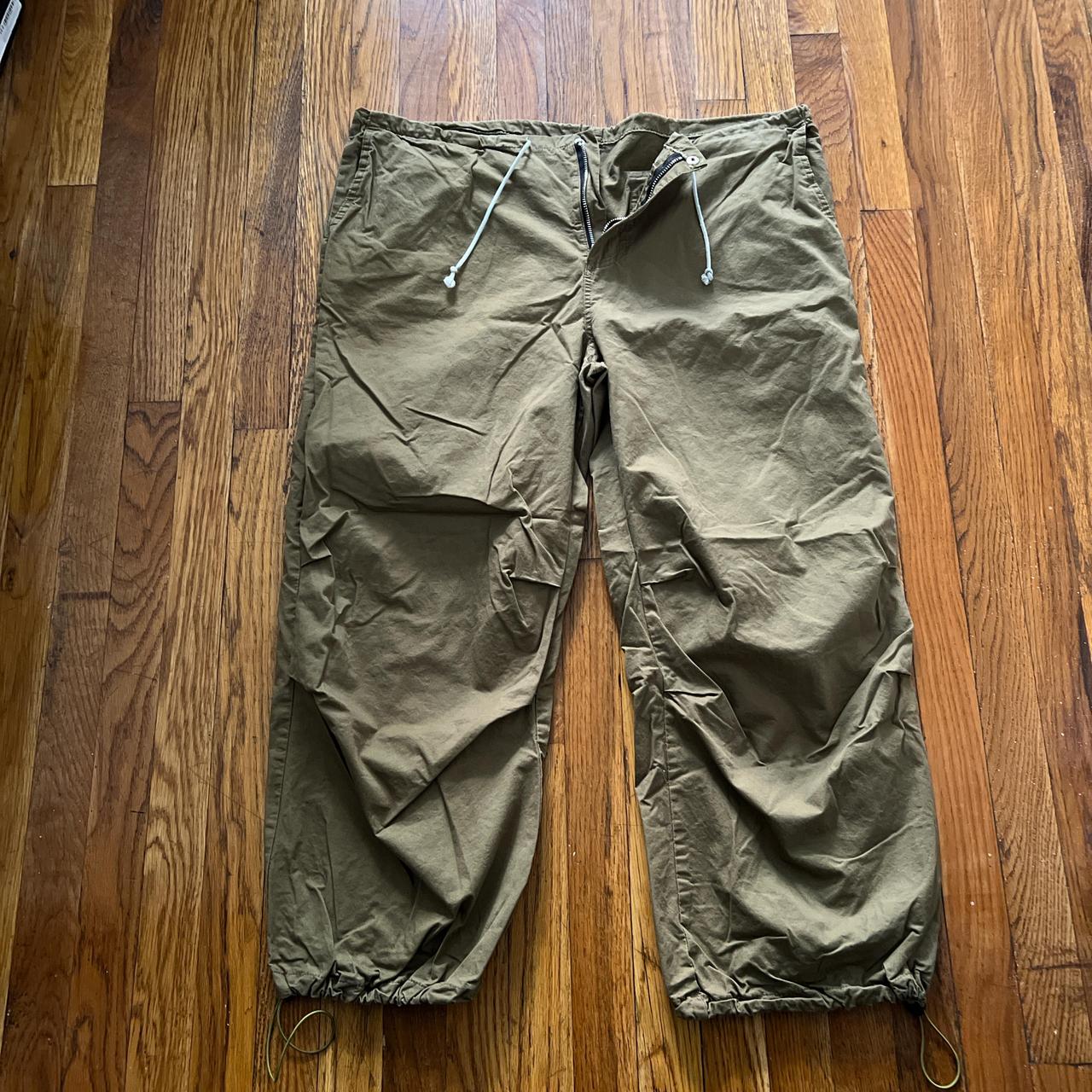 Army green parachute pants from Amazon. - Depop