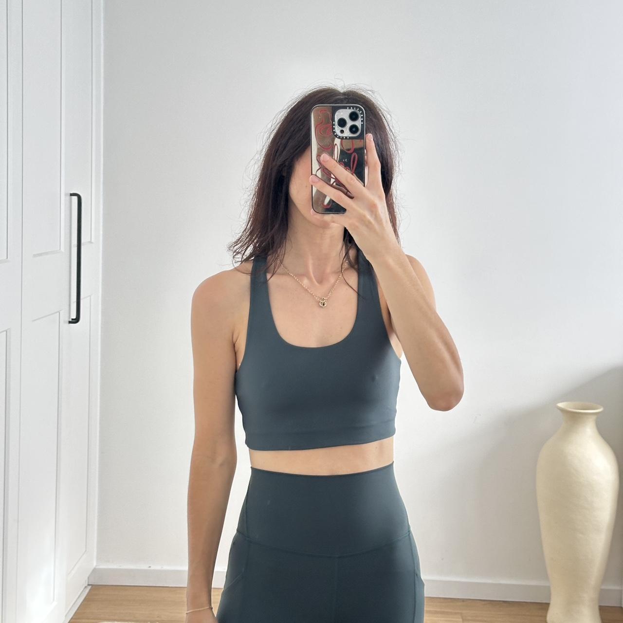 Quince racer back cropped sports bra with inbuilt... | Depop