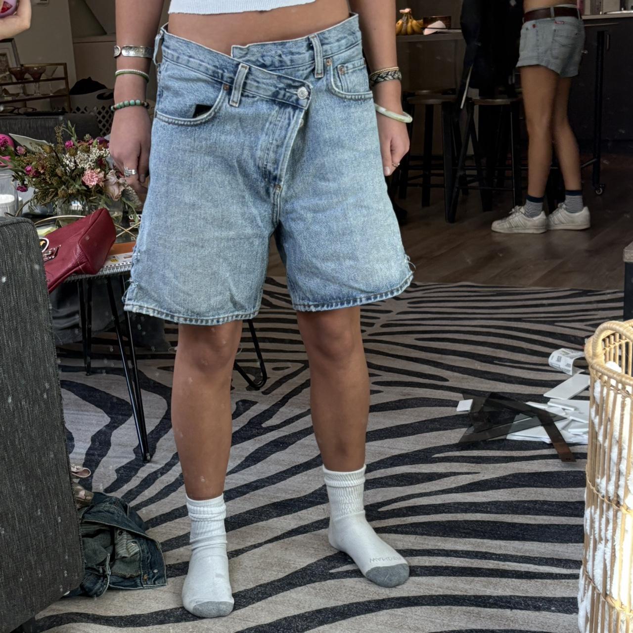 light wash denim jorts with a cross buttons - Depop