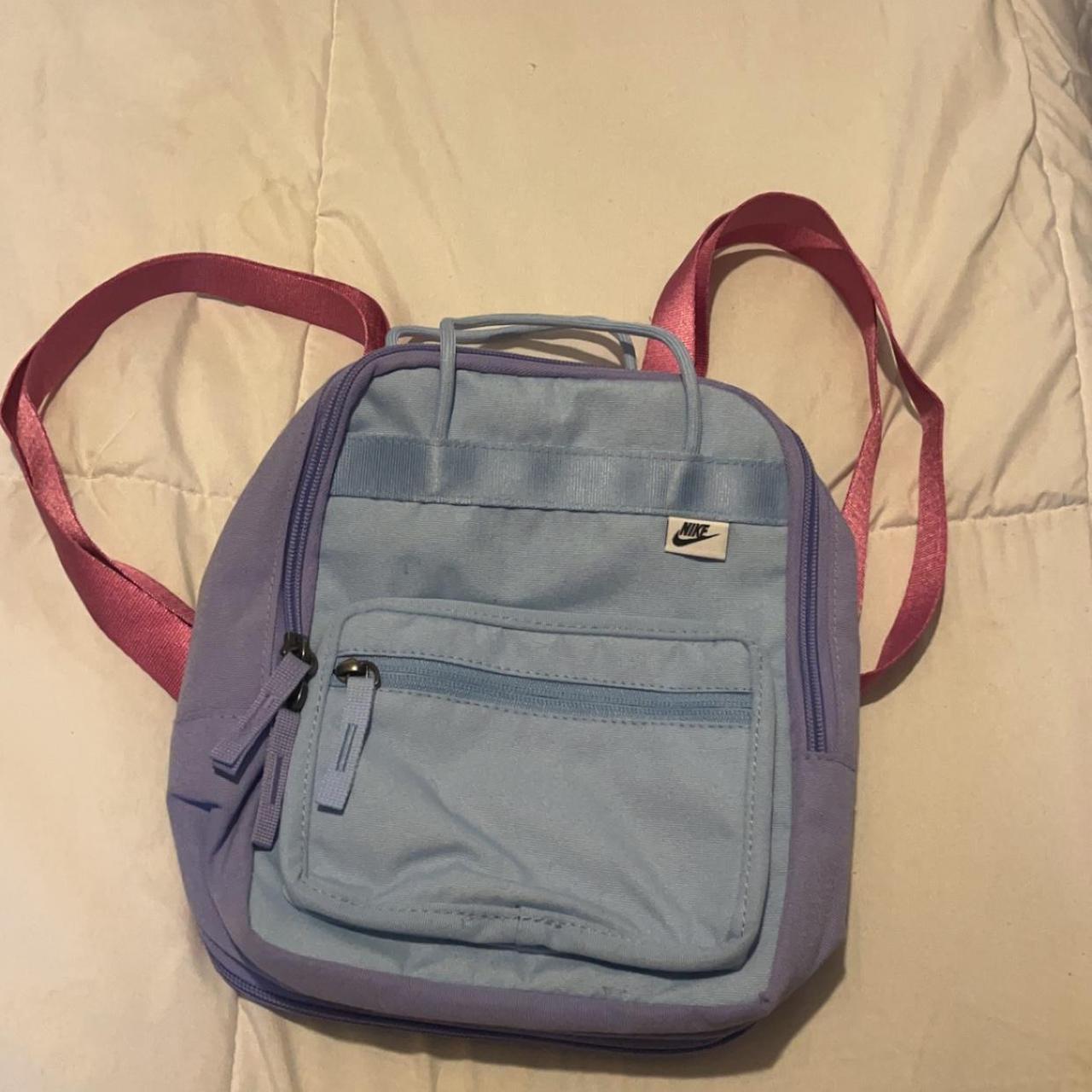 Small Nike backpack. Blue front purple middle pink... - Depop