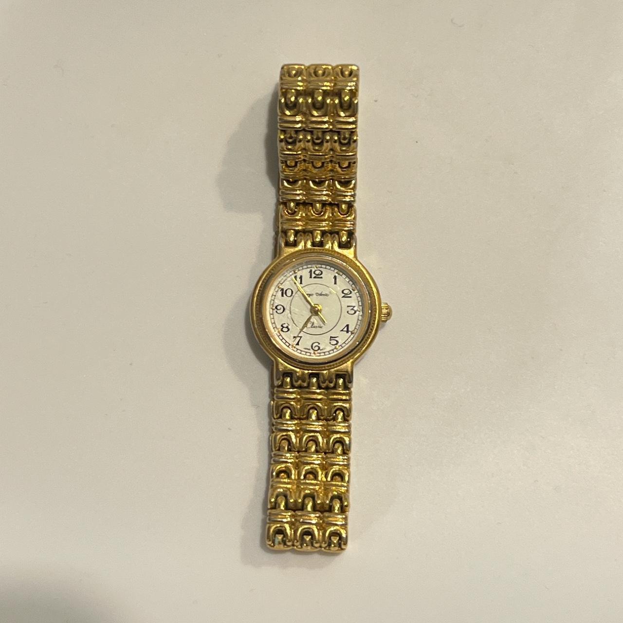 Gold colored Sergio Valente watch. Glass is a bit... - Depop