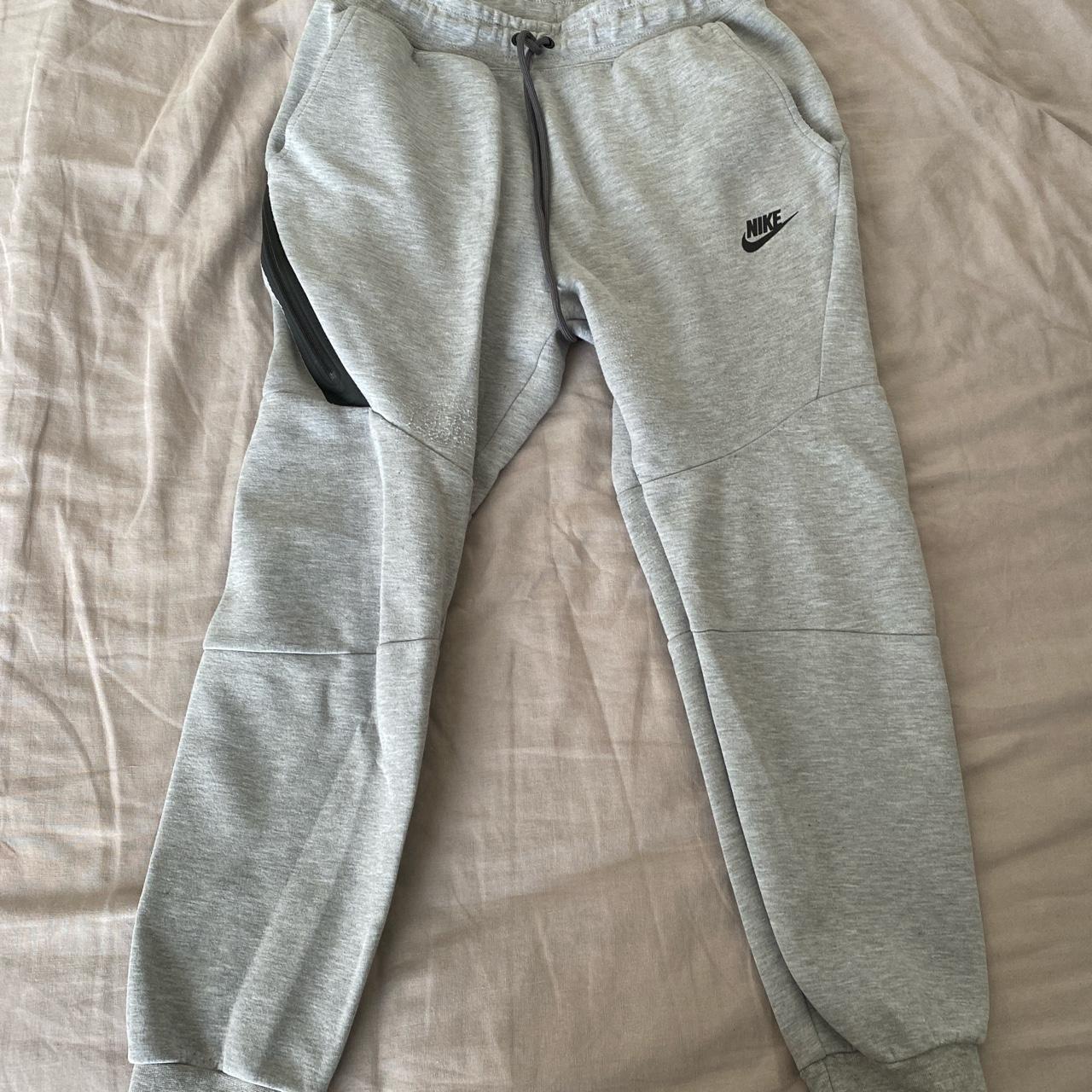 nike tech fleece trackies in grey near perfect... - Depop
