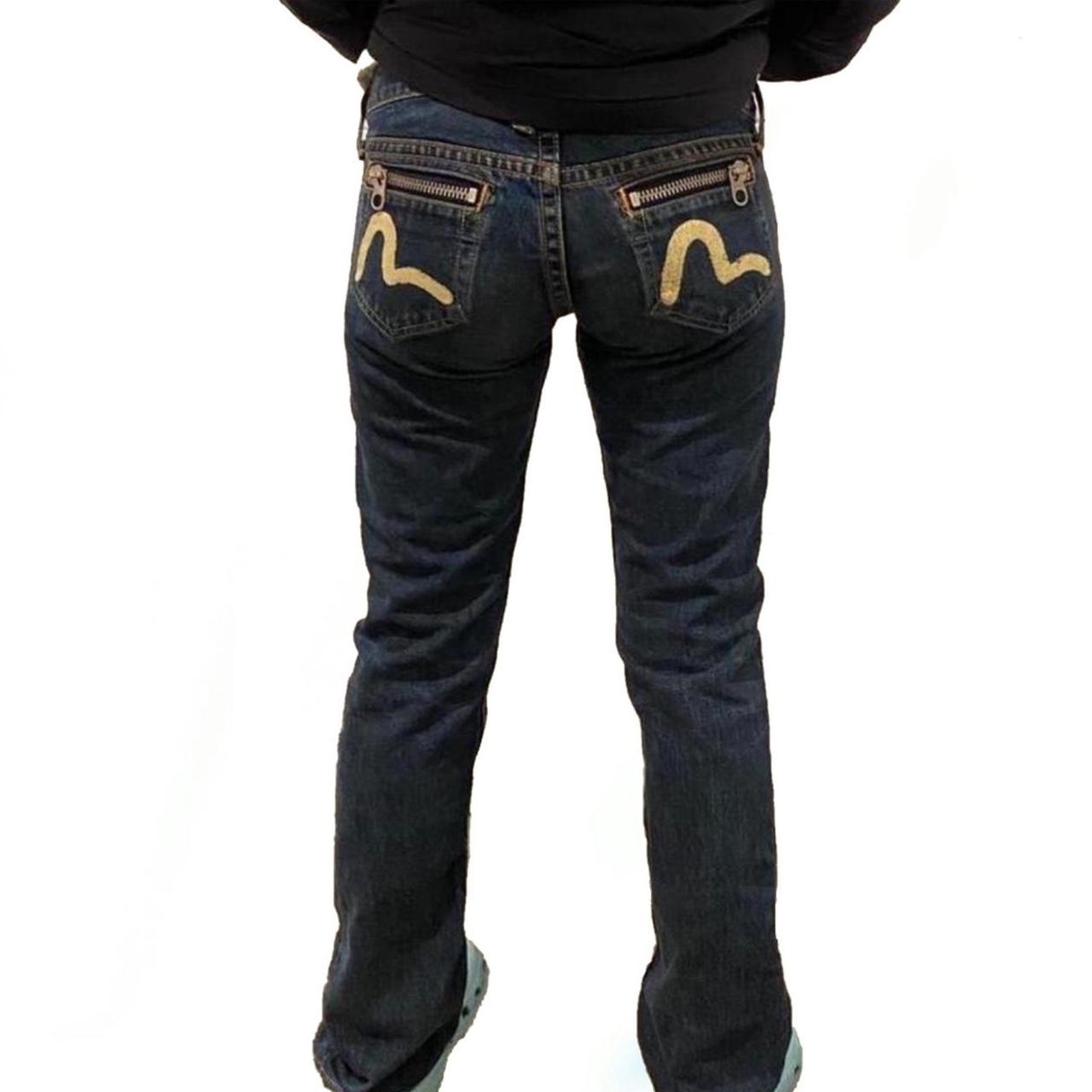 Evisu Women's Blue and Navy Jeans | Depop