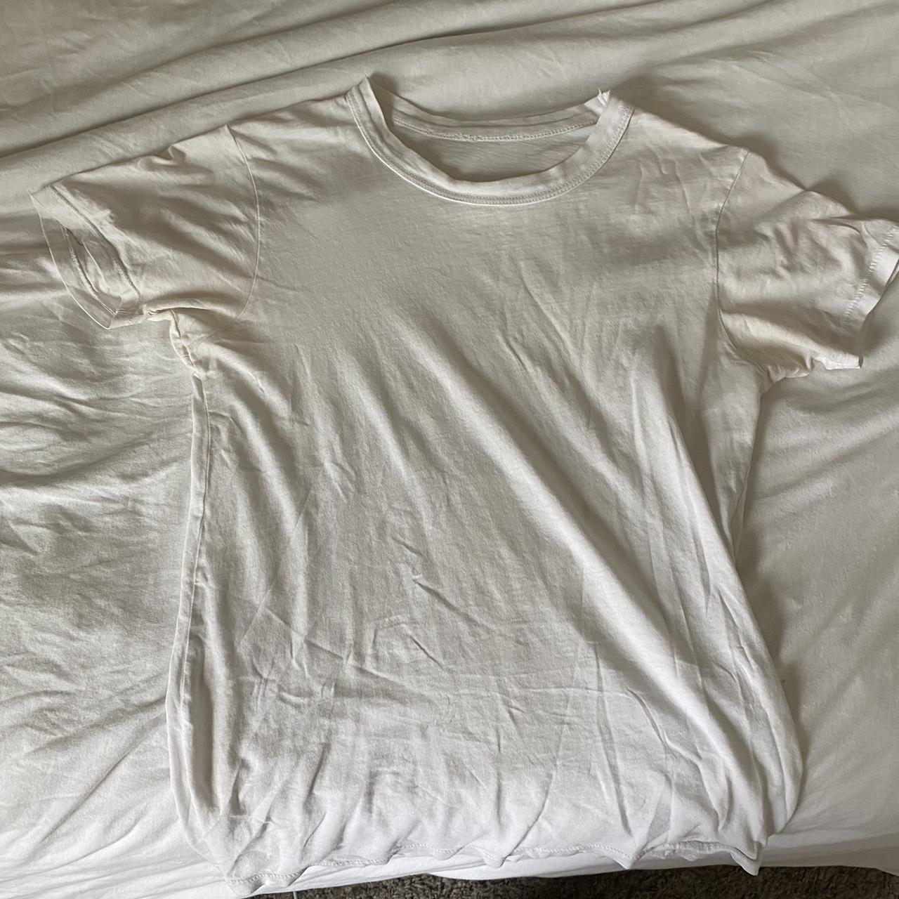 Brandy Melville Tee Basic white tee, slight tear... - Depop