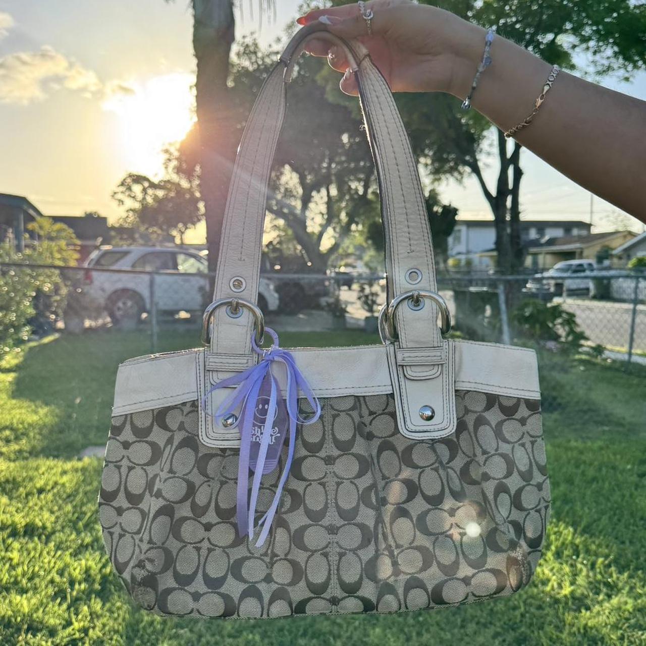 cute Coach white leather detail and signature canvas... | Depop