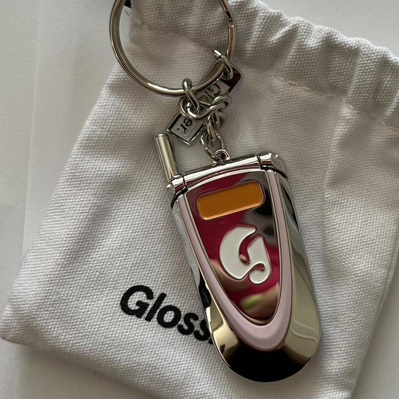 Glossier Flip Phone Keychain Brand new with no tags... - Depop