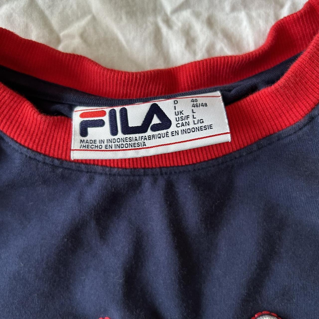 Fila shirt, fits like a cropped baby tee, tag says... - Depop
