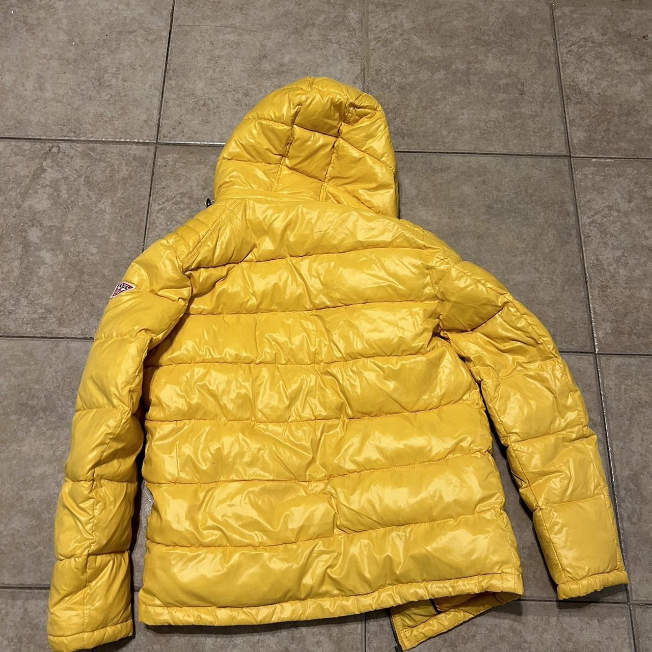 Medium yellow Guess puffer jacket. Barely worn,... - Depop