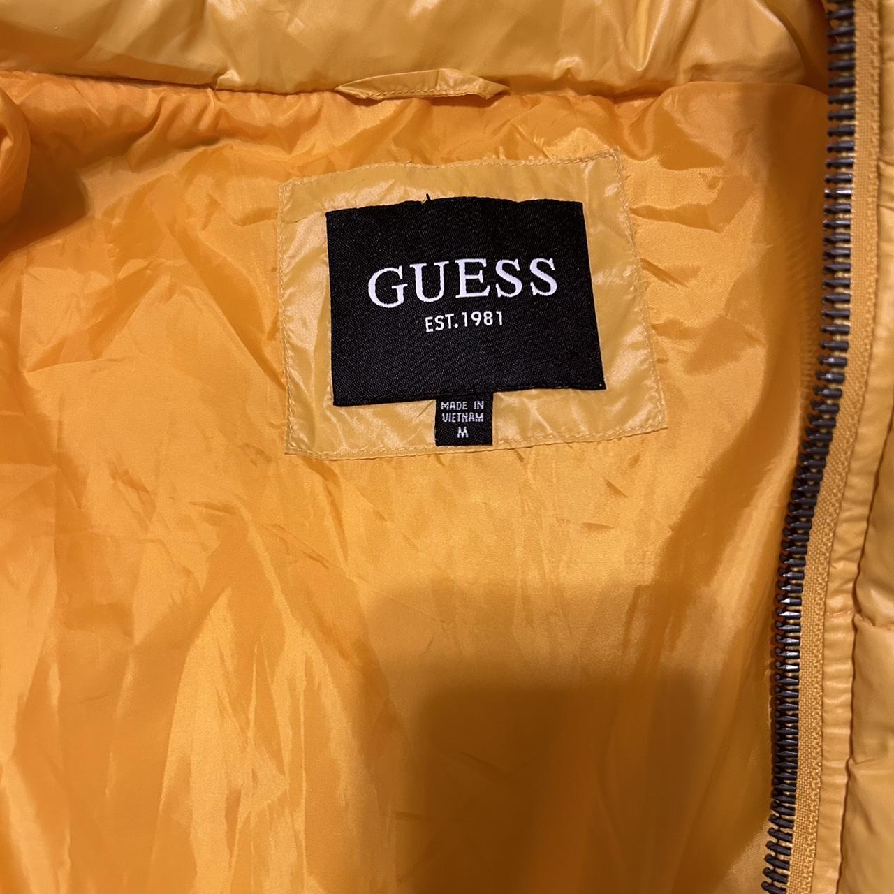 Medium yellow Guess puffer jacket. Barely worn,... - Depop