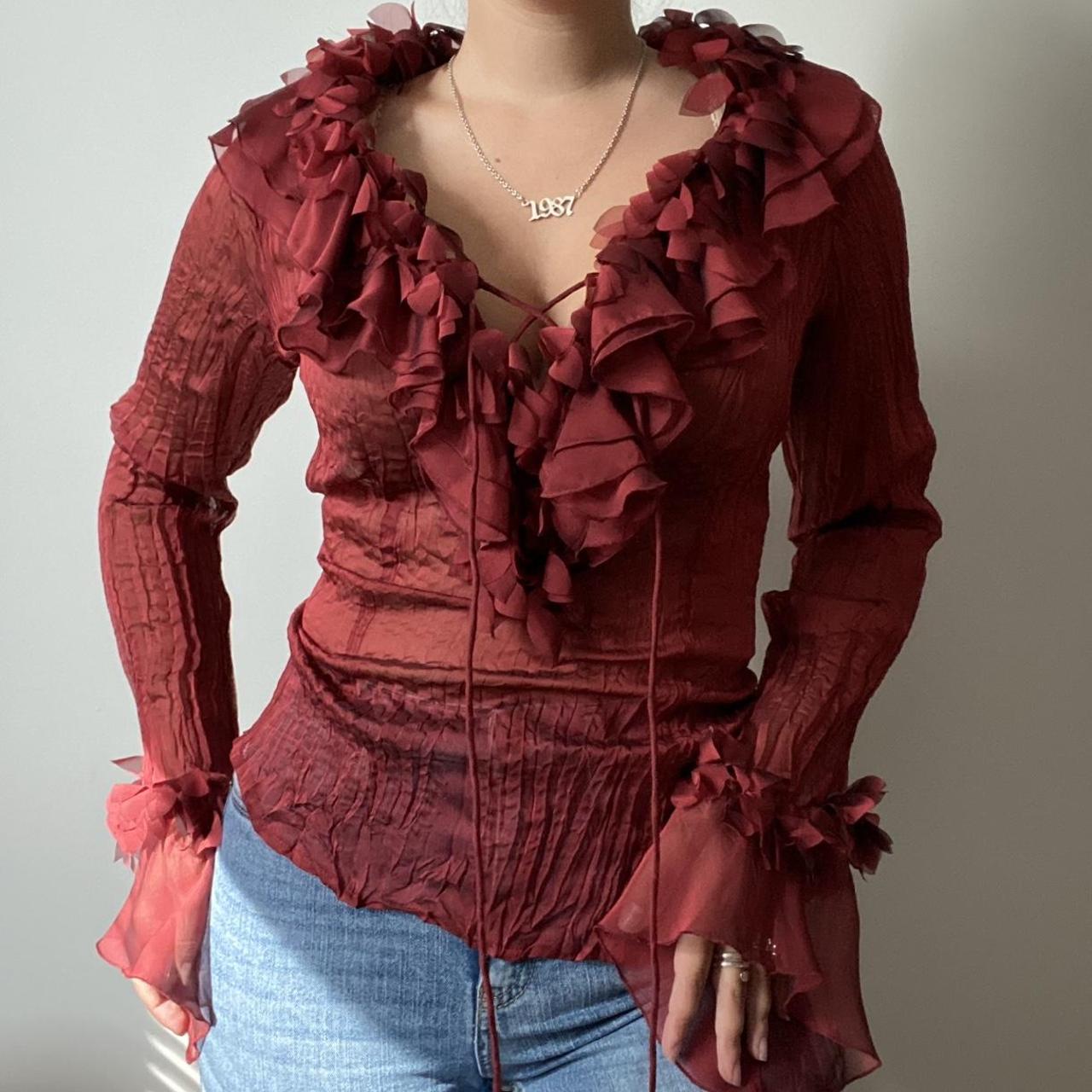 Burgundy red frilly top. This long sleeve blouse... - Depop