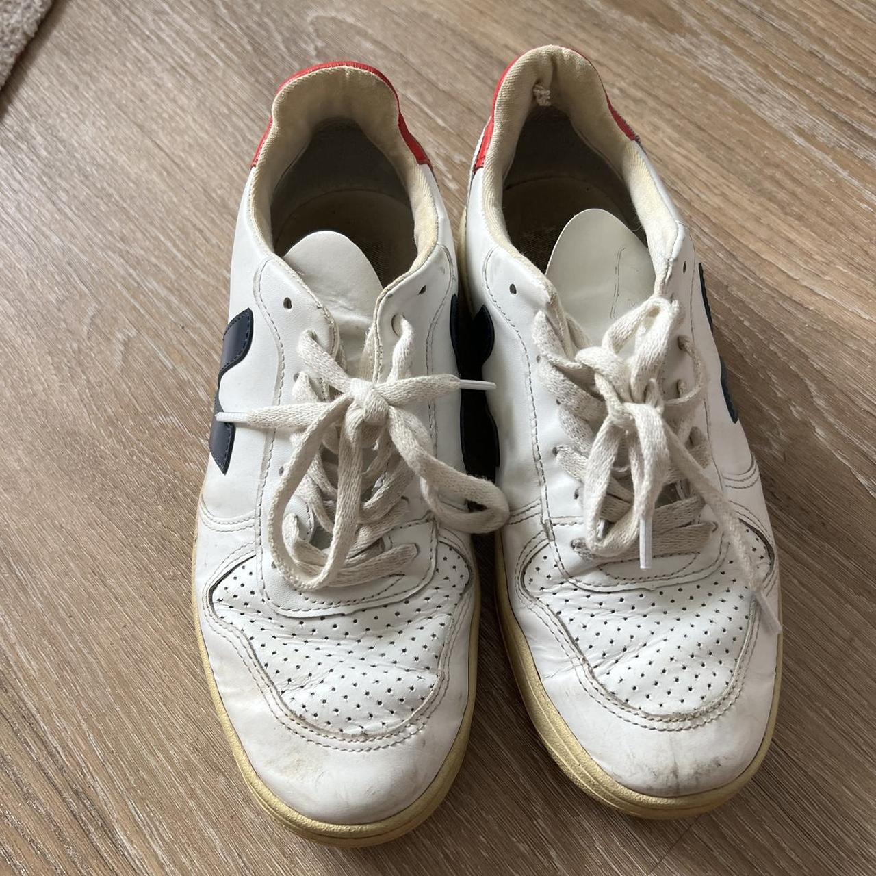 Worn in vejas with red and blue details, soles in... - Depop